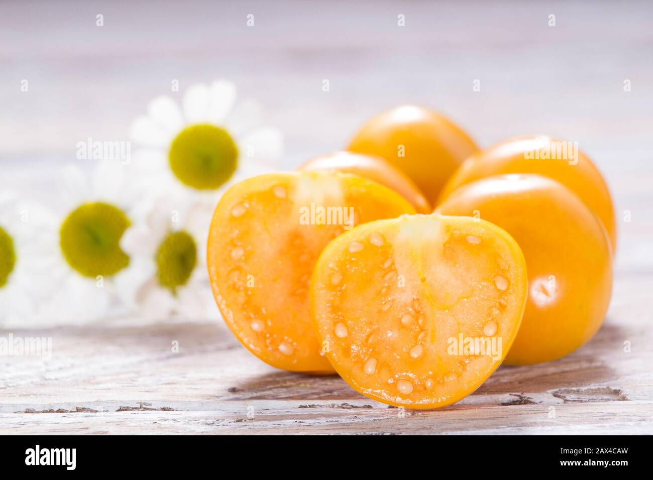 fruit of cape gooseberry, uvilla on wooden background Stock Photo - Alamy