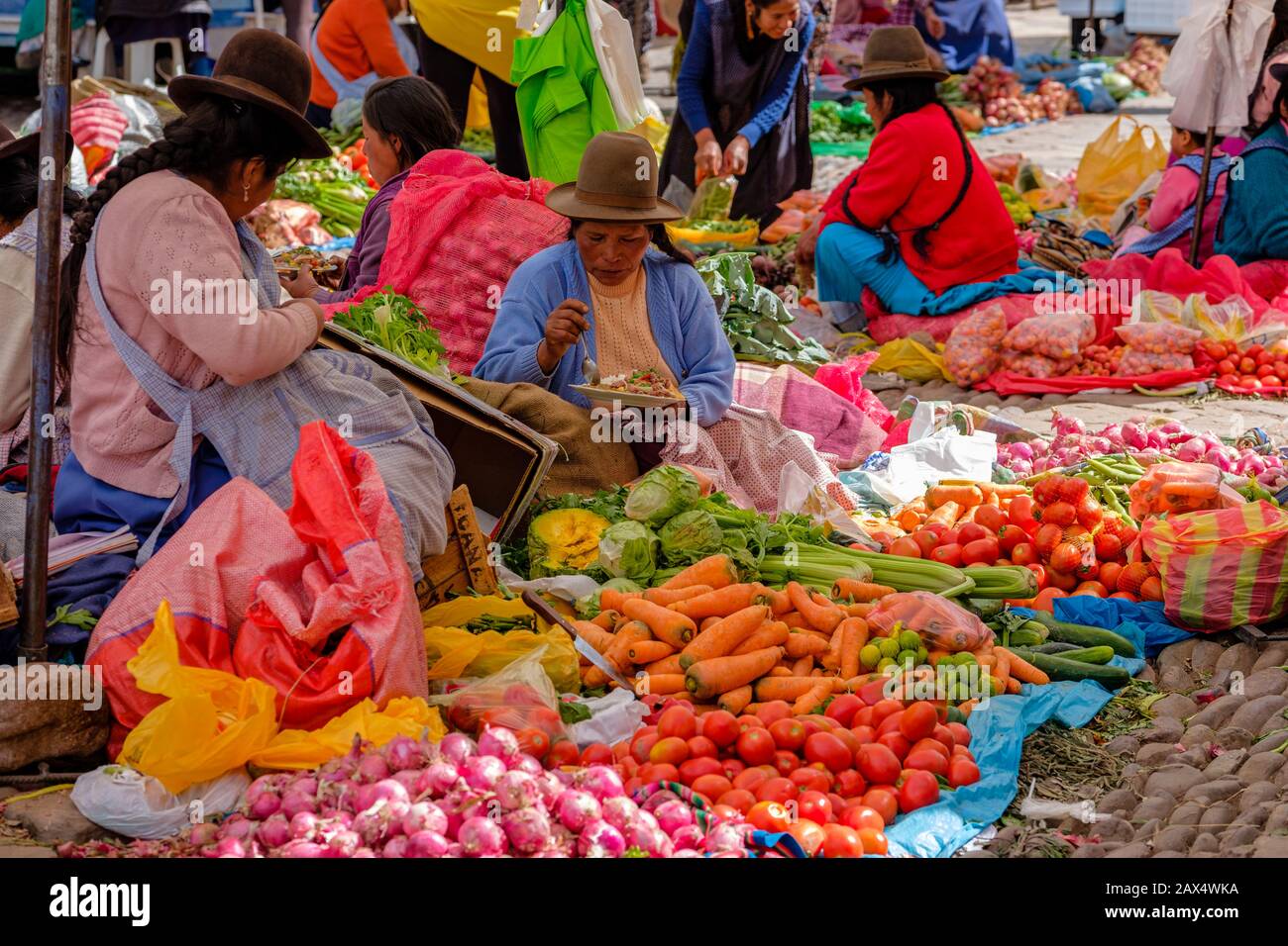 Peru market town of Pisac, vendors, locals at the city of Pisac outdoor ...