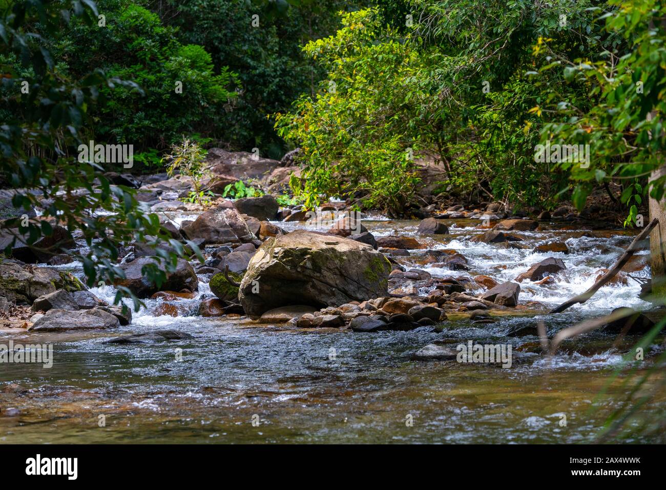 Fast flowing water over rocks at Tully River Gorge North Queensland ...