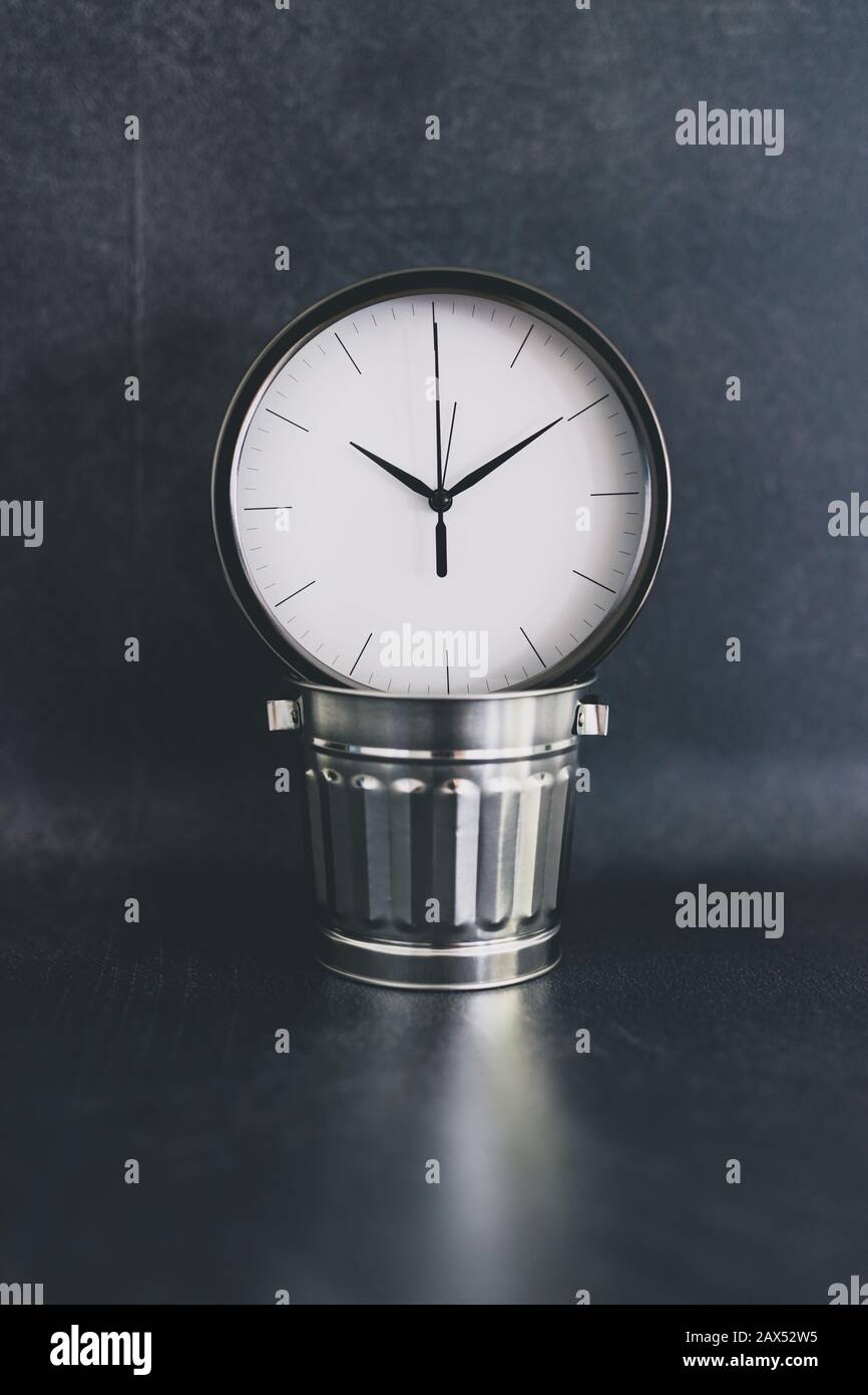 not wasting time conceptual still-life, oversize clock with miniature ...