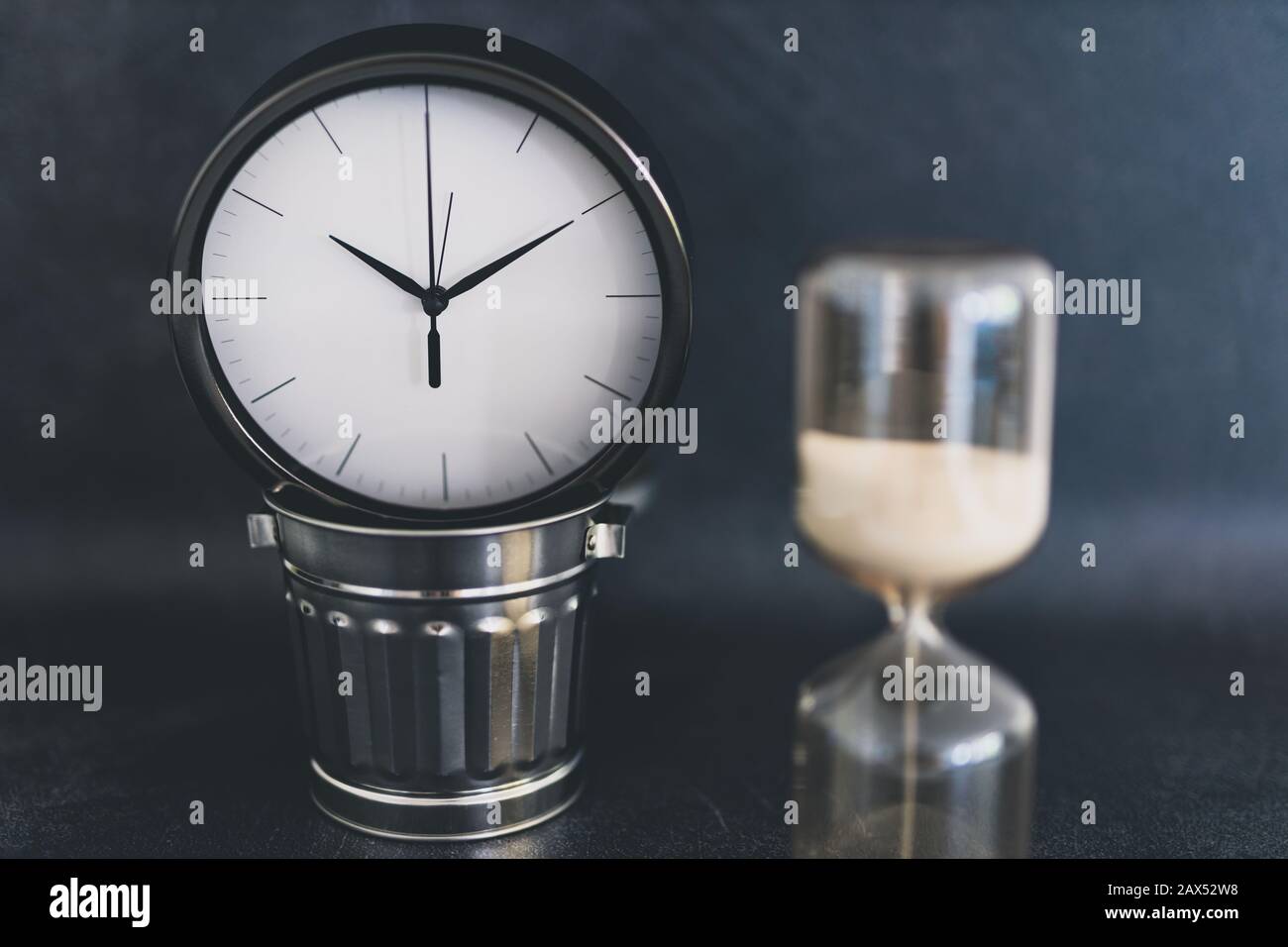 not wasting time conceptual still-life, oversize clock with miniature ...