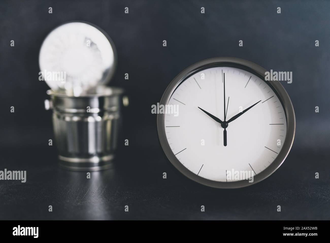 not wasting time conceptual still-life, oversize clock with miniature ...