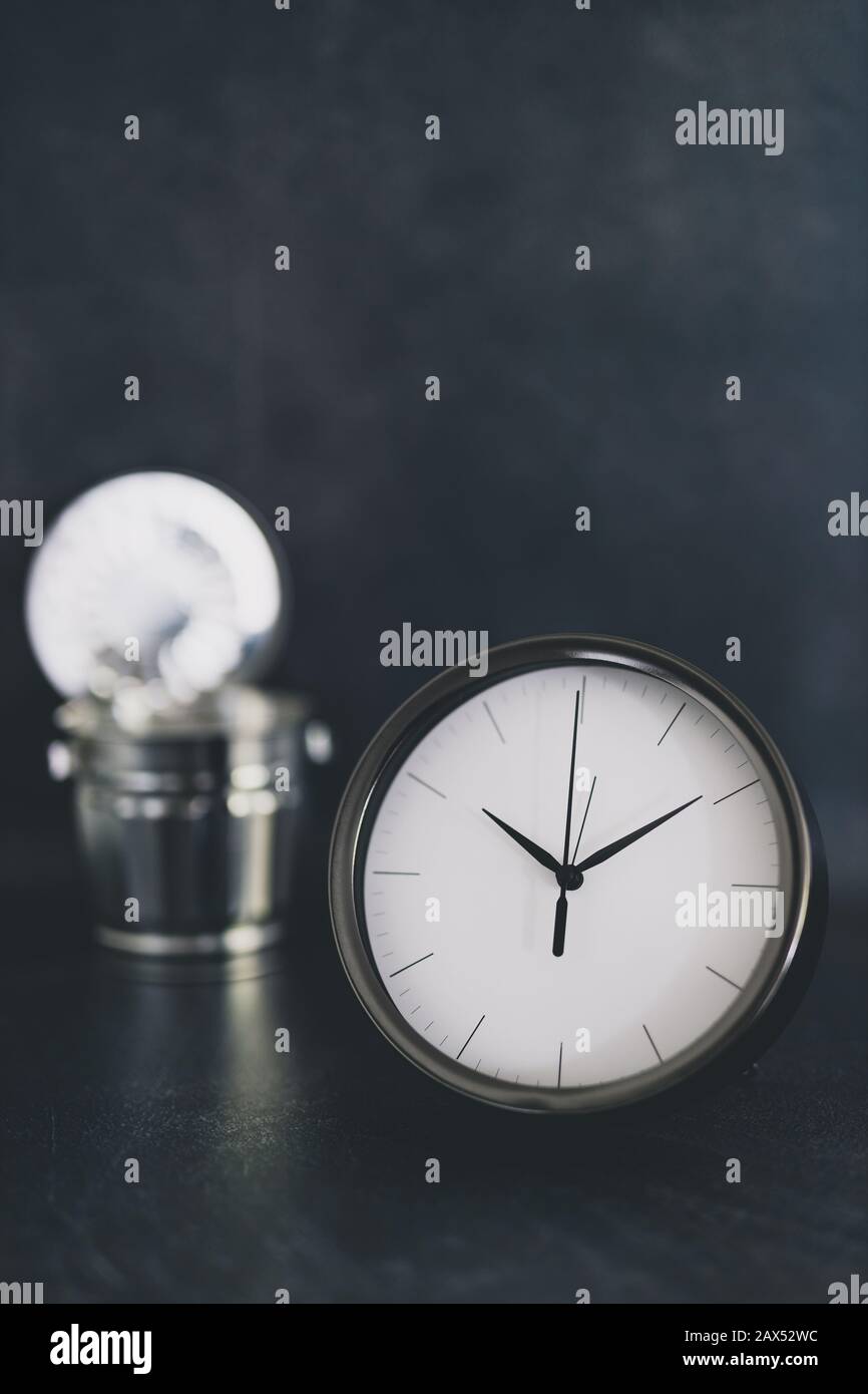 not wasting time conceptual still-life, oversize clock with miniature ...