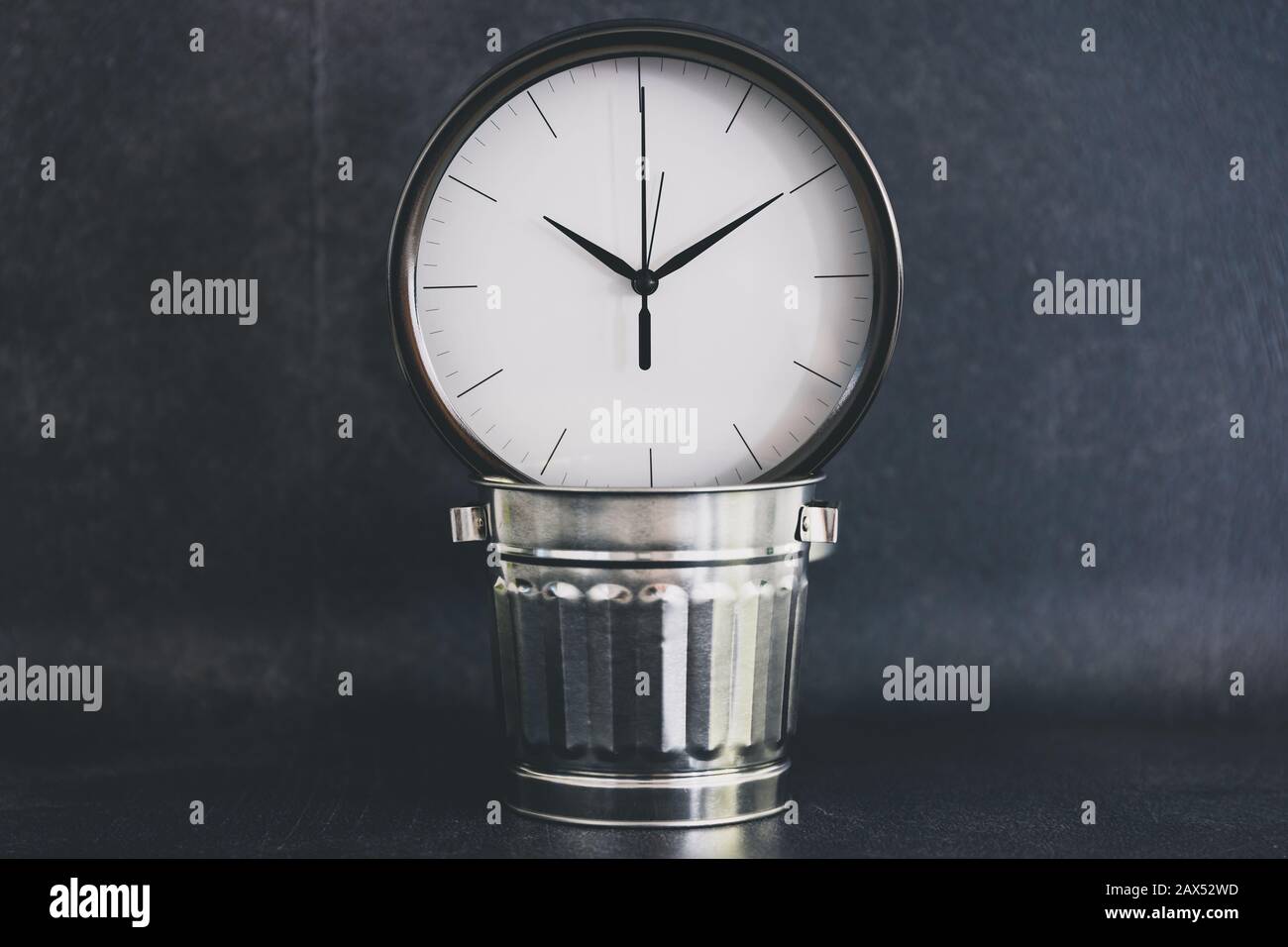 not wasting time conceptual still-life, oversize clock with miniature ...