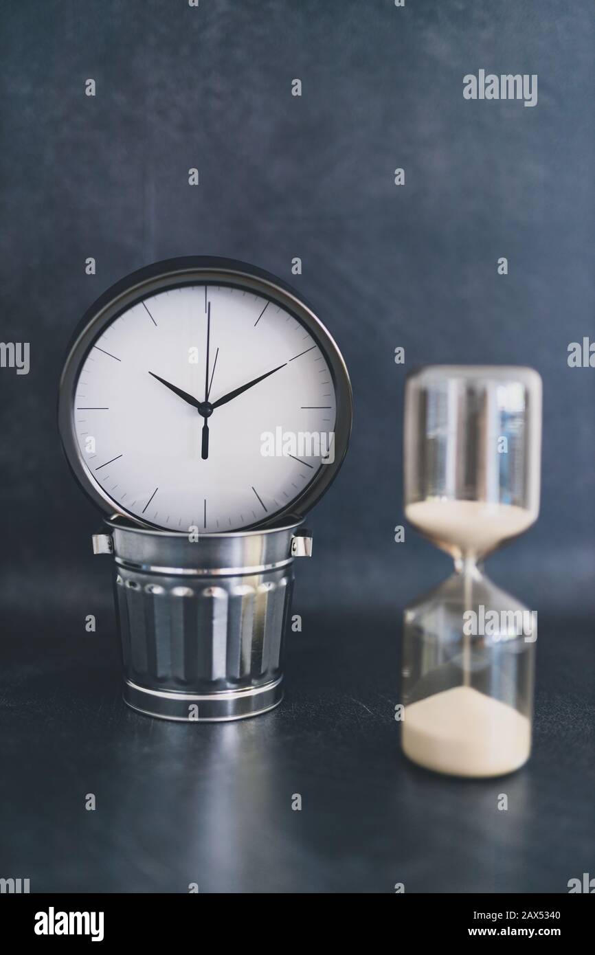 not wasting time conceptual still-life, oversize clock with miniature ...