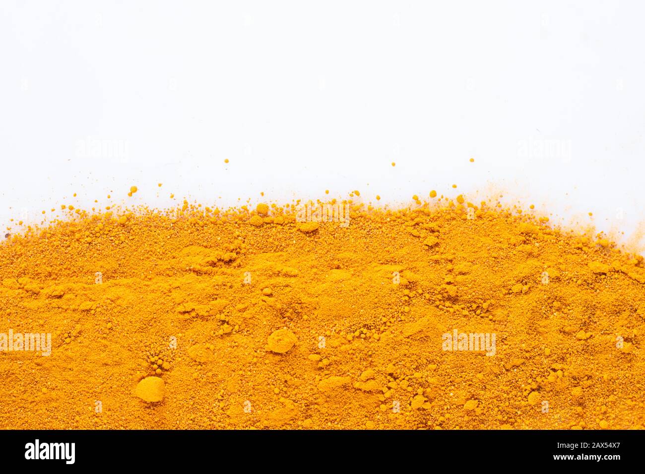 turmeric powder isolated on white background Stock Photo - Alamy