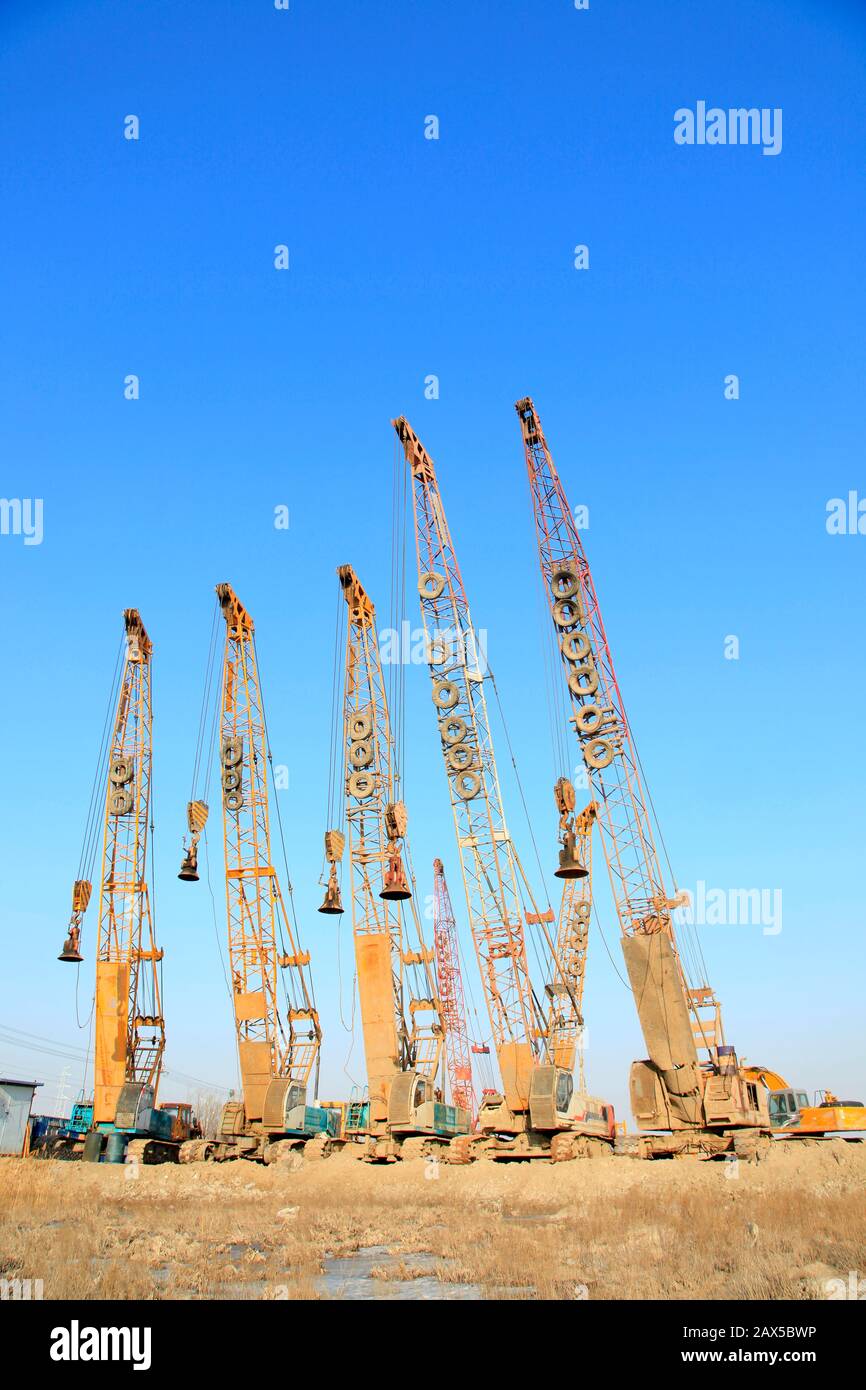 Crawler crane in the construction site Stock Photo - Alamy