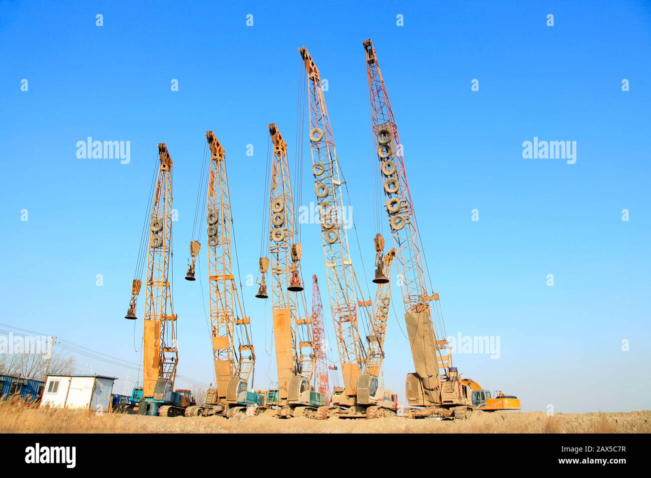 Crawler crane in the construction site Stock Photo - Alamy