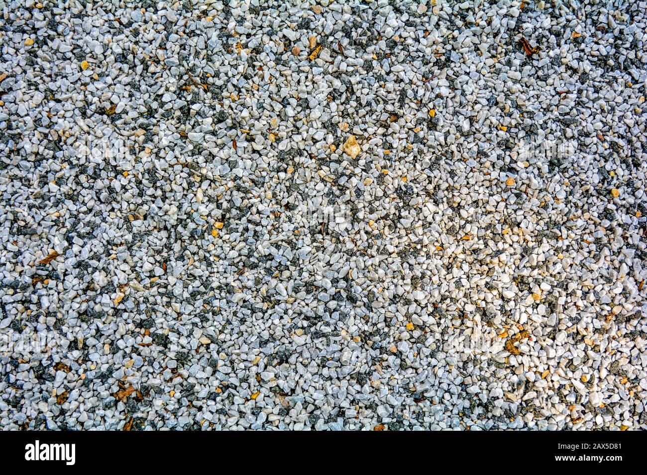 Small White and yellow pebble background. Top view of white and yellow ...