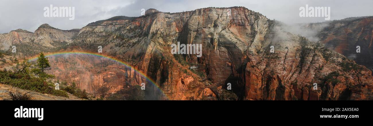 Rainbow in zion canyon with red rocks and gorgeous views Stock Photo ...