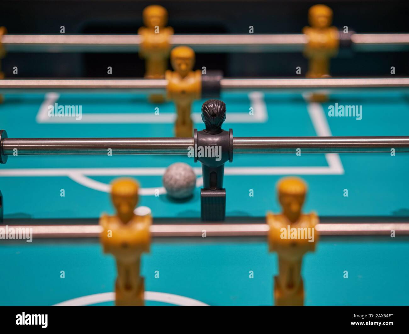 Table football scene. Focused on forward who has the chance to shoot a ...