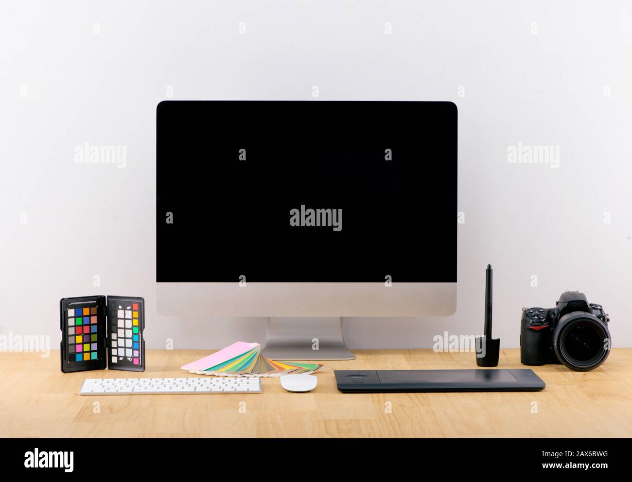 Front view of home office graphic designer desktop with blank copy ...