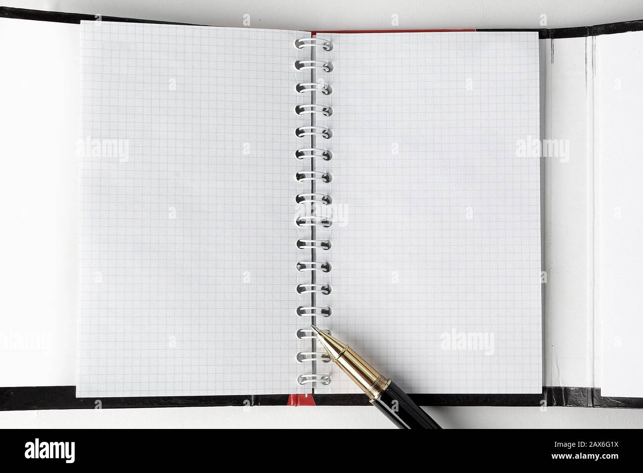 close up. open organizer and pen on white background .photo with copy ...