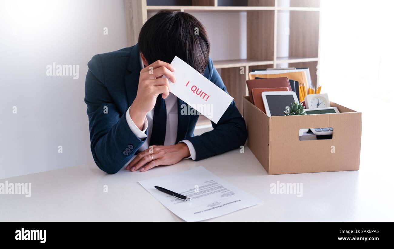 Businessman holding with I quit words card letter, resign employee ...