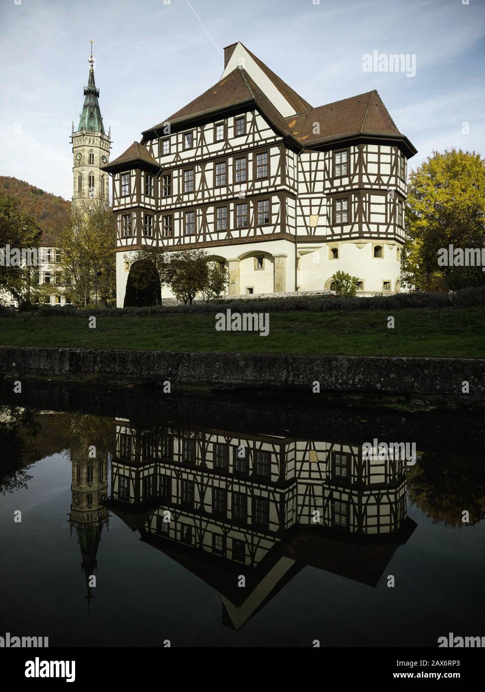 Reflection of Residenzschloss Urach in the river Erms in Bad Urach ...