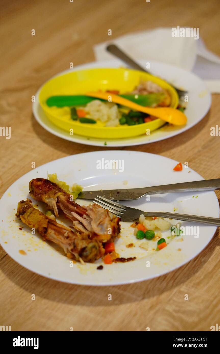 Vertical shot of the remains of food after people finished eating Stock ...