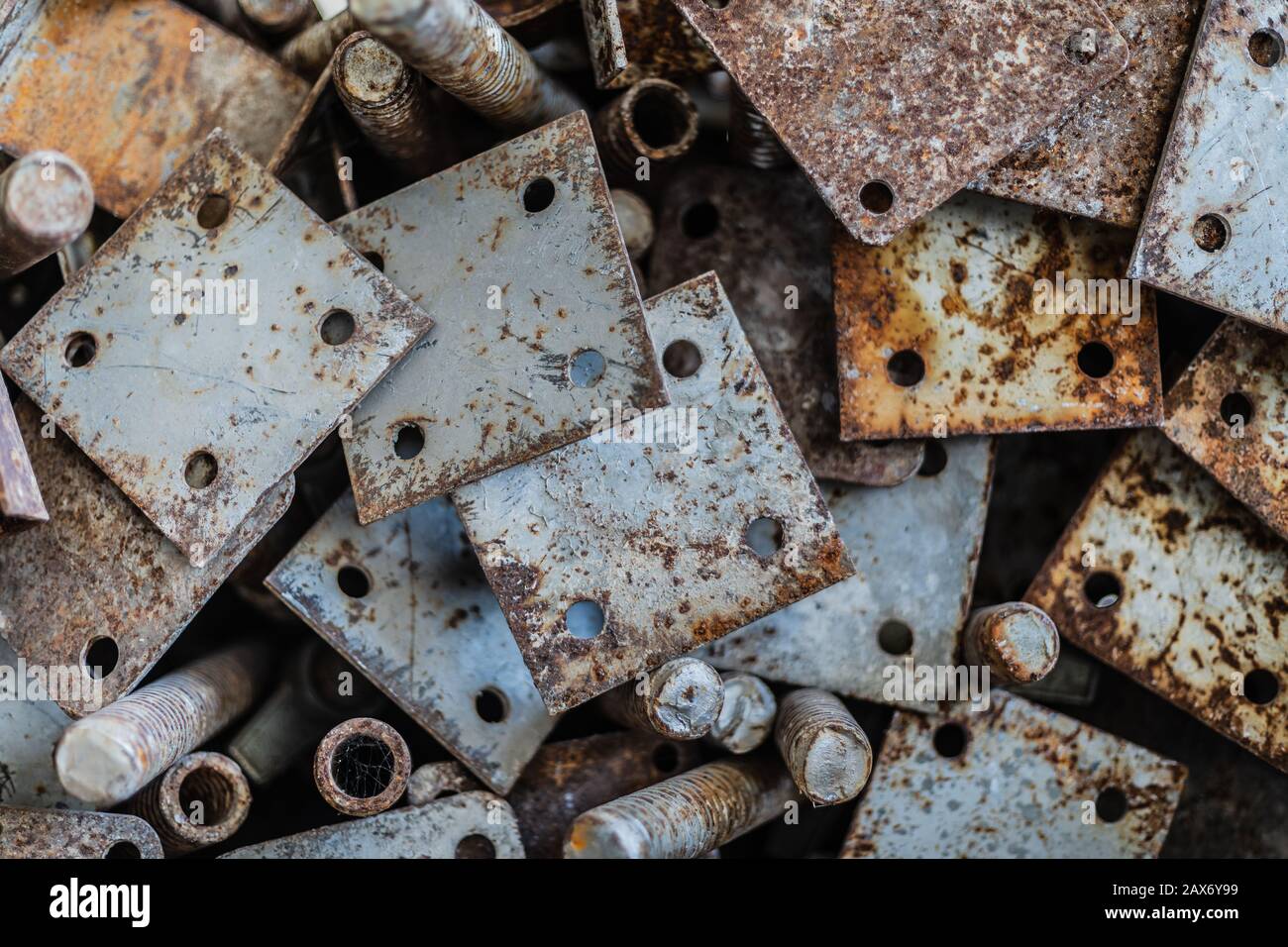 grunge steel plate stack in construction site Stock Photo - Alamy