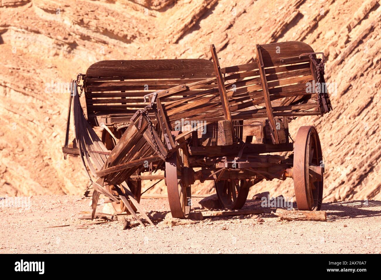 Old wooden cart on the sandy ground in a deserted area Stock Photo - Alamy