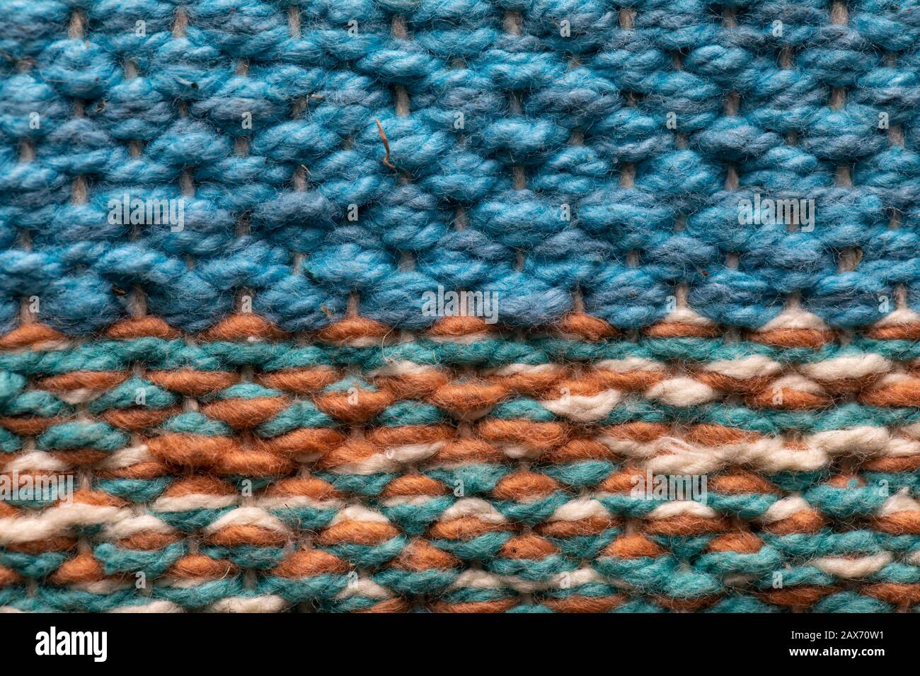 brown, white, green and blue color. fine grain felt fabric background ...