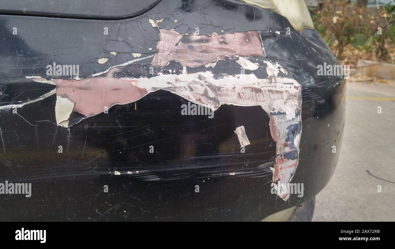 The side of the front of the car is chipped Stock Photo - Alamy
