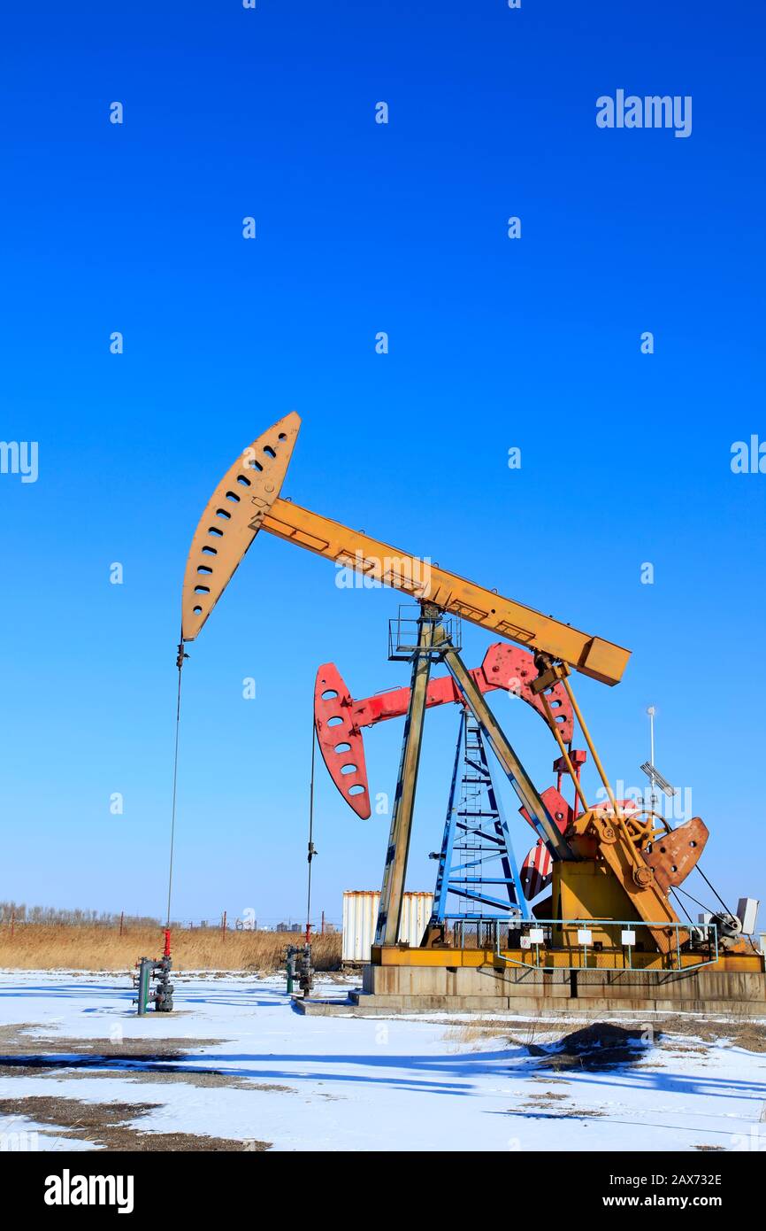 Oil field, oil pump in the work Stock Photo - Alamy