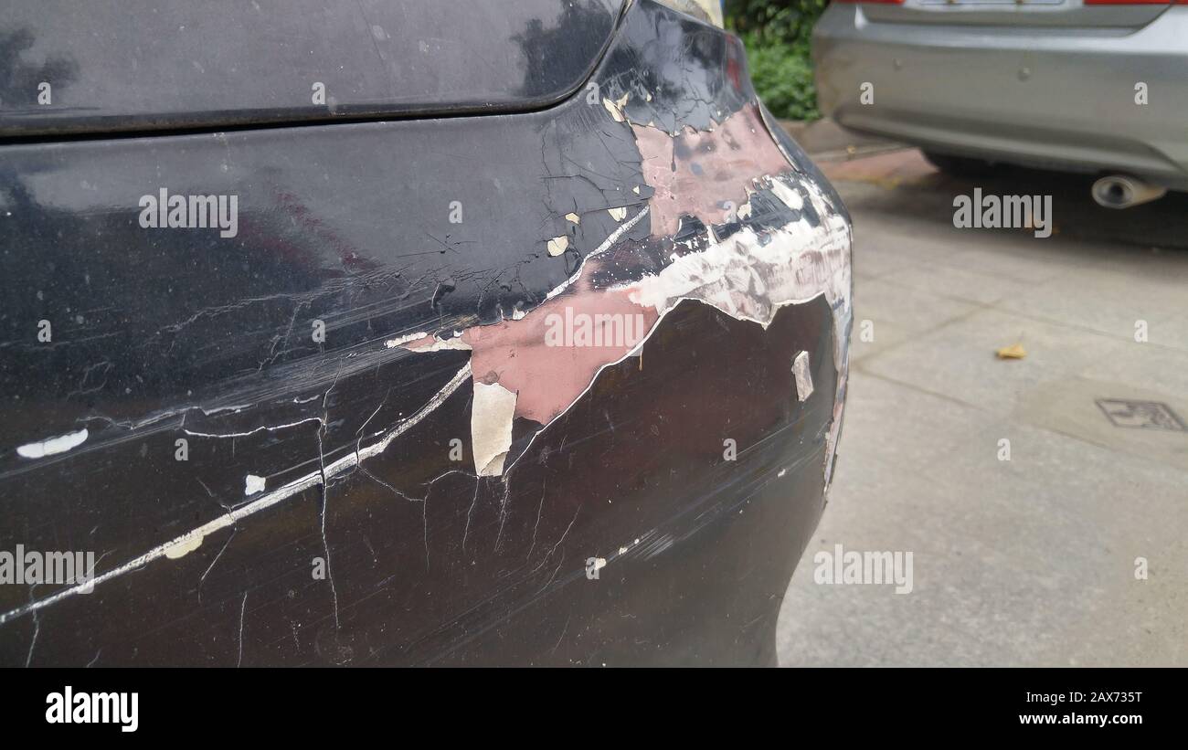 The side of the front of the car is chipped Stock Photo - Alamy