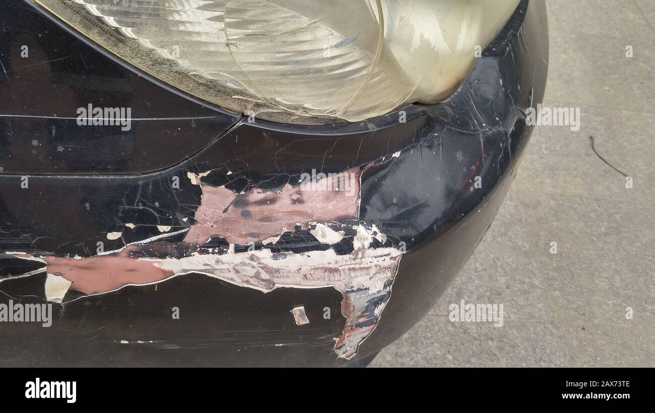 The side of the front of the car is chipped Stock Photo - Alamy