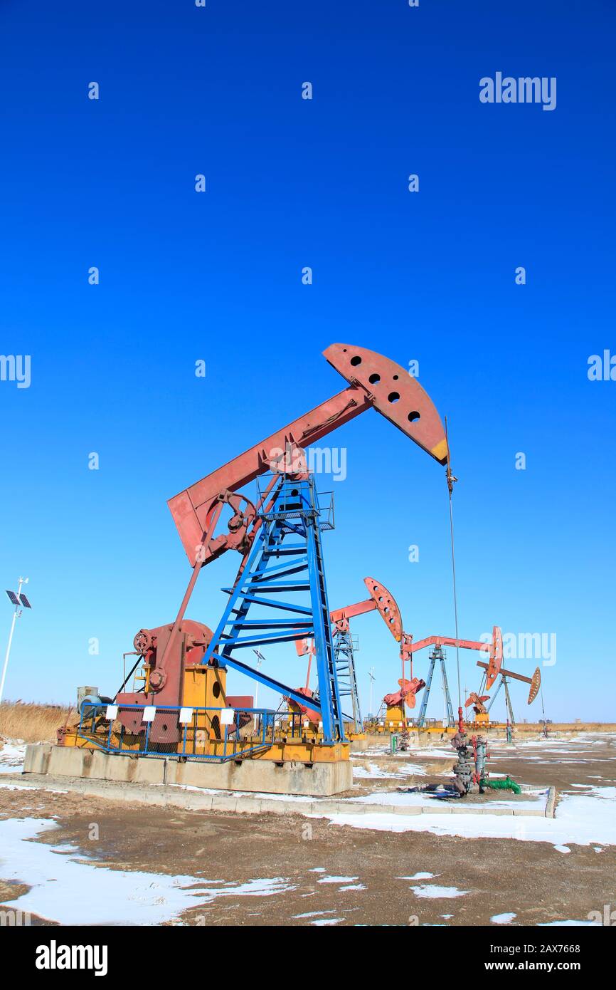 Oil field, oil pump in the work Stock Photo - Alamy