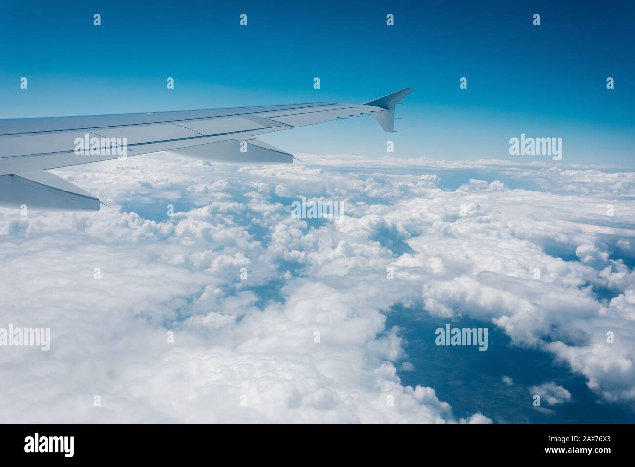 Wing aircraft in altitude during flight Stock Photo - Alamy