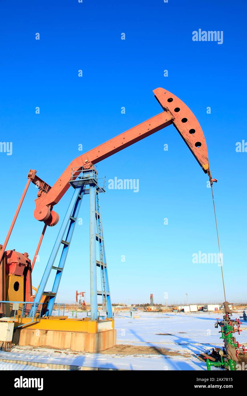 Oil field, oil pump in the work Stock Photo - Alamy
