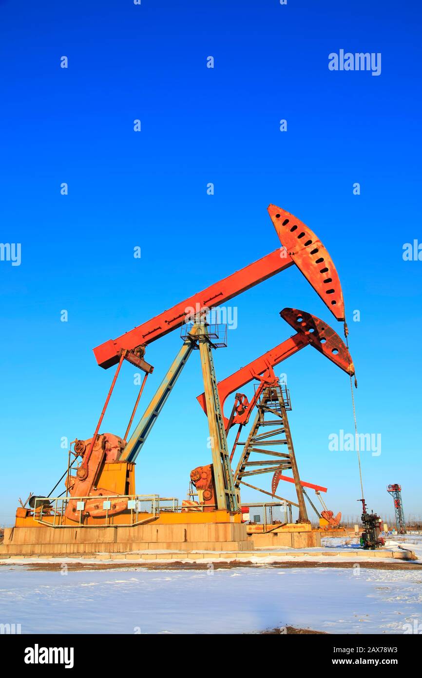 Oil field, oil pump in the work Stock Photo - Alamy