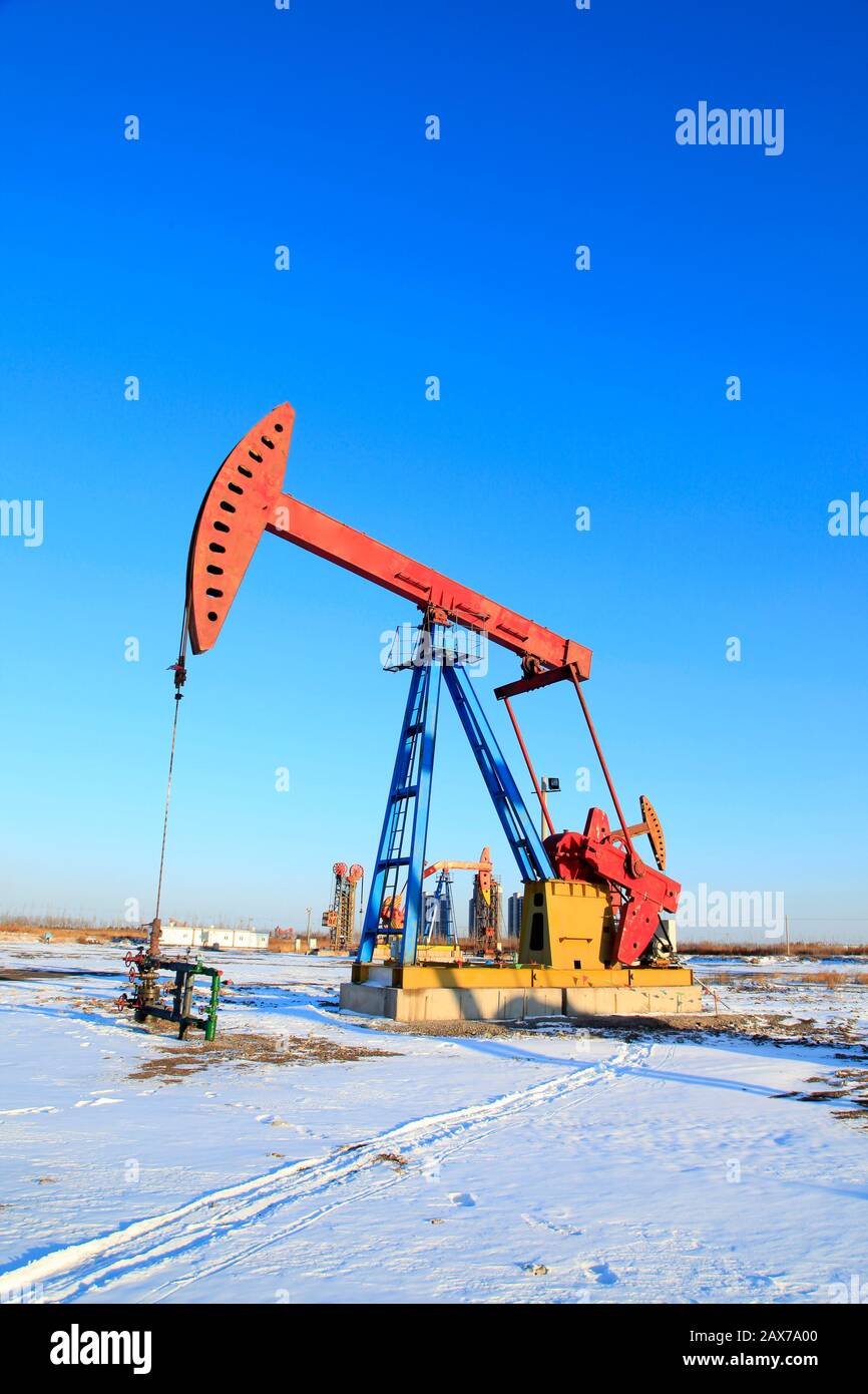 Oil field, oil pump in the work Stock Photo - Alamy