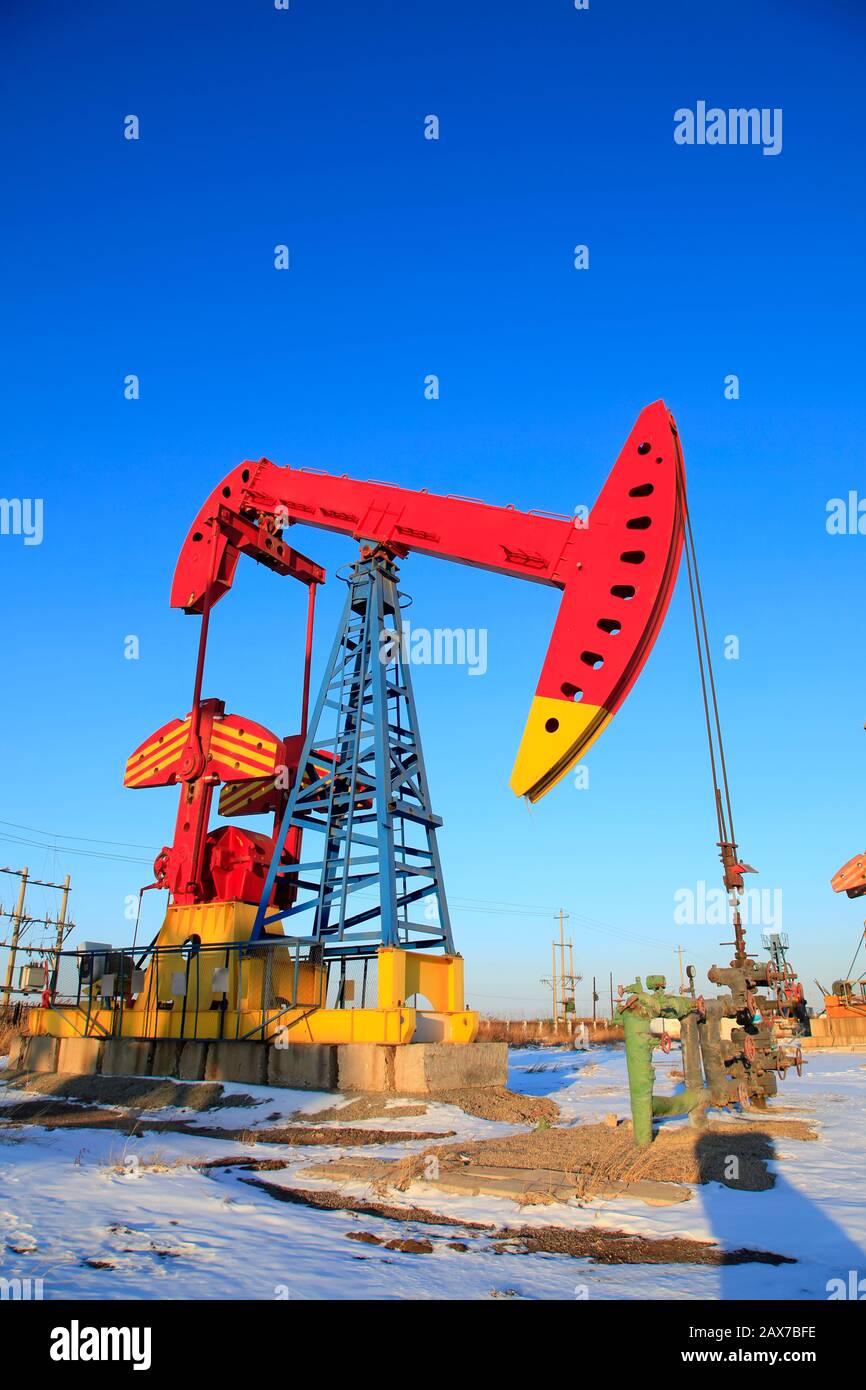 Oil field, oil pump in the work Stock Photo - Alamy