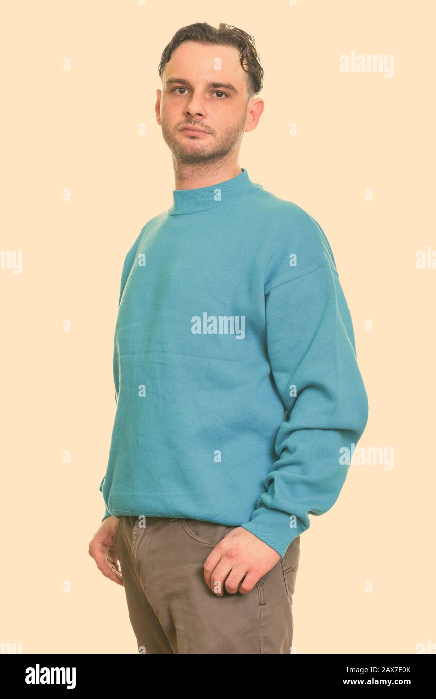 Man looking over shoulder hi-res stock photography and images - Alamy