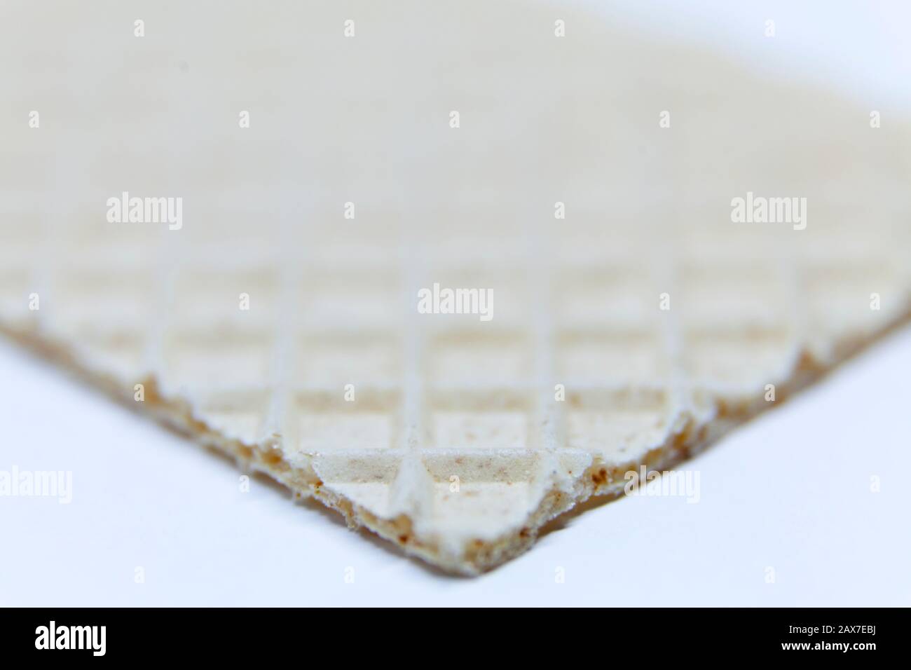 a simple diamond biscuit on white background Stock Photo - Alamy