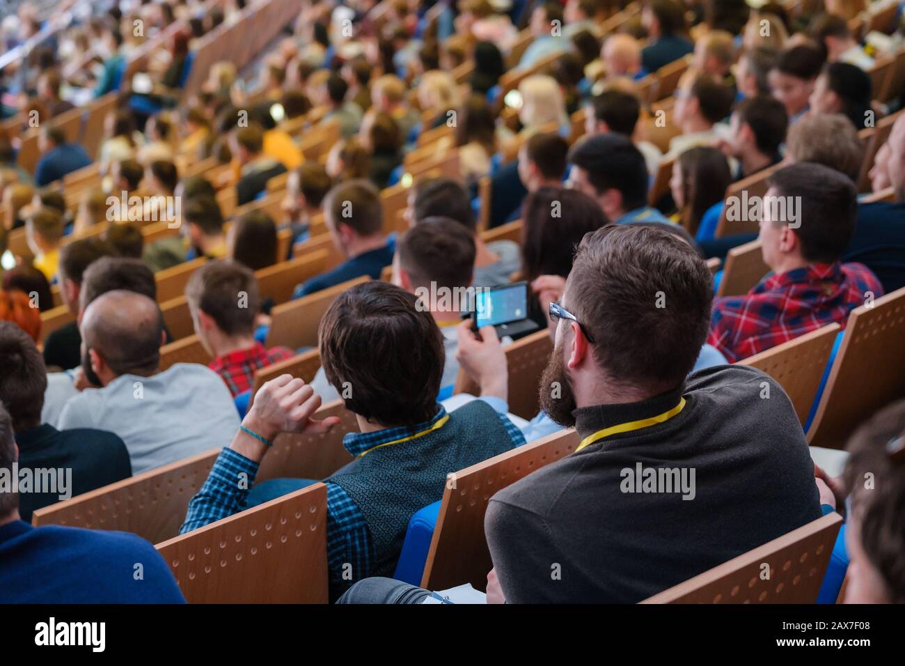 Business conference attendees sit listen hi-res stock photography and ...