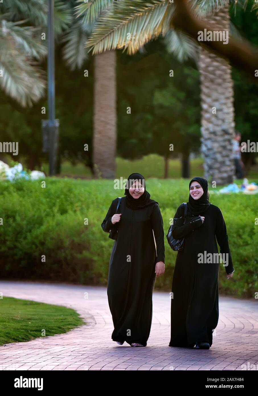 Two Saudi ladies walking in Al Salam park in Riyadh, Saudi Arabia Stock ...