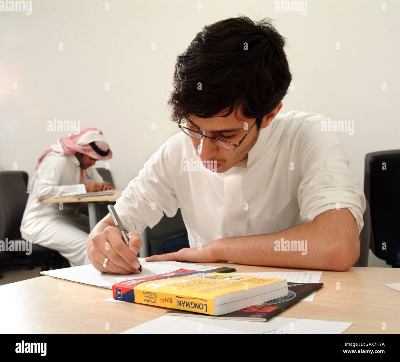Saudi college student doing his final examination in Riyadh, Saudi ...