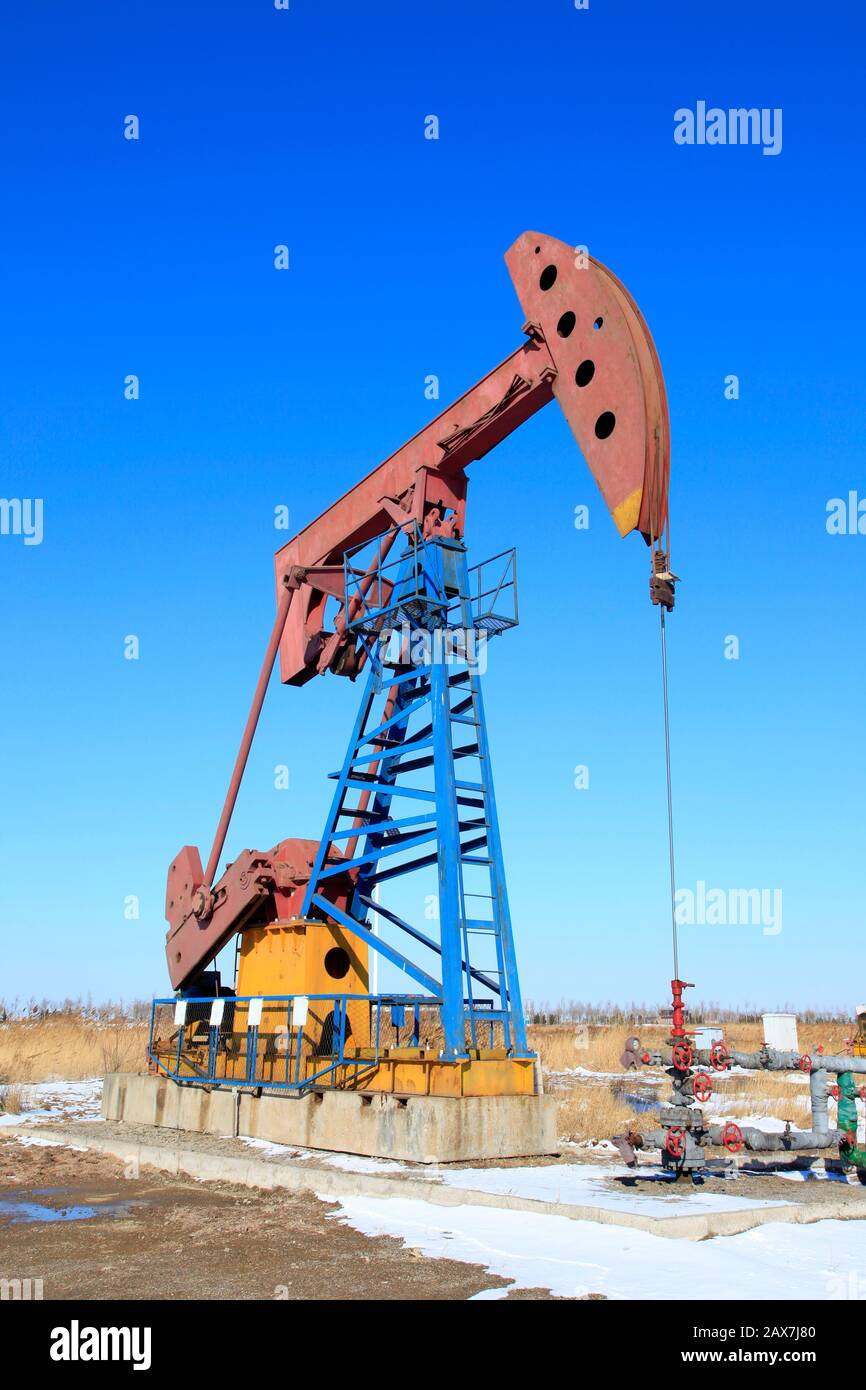 Oil field, oil pump in the work Stock Photo - Alamy
