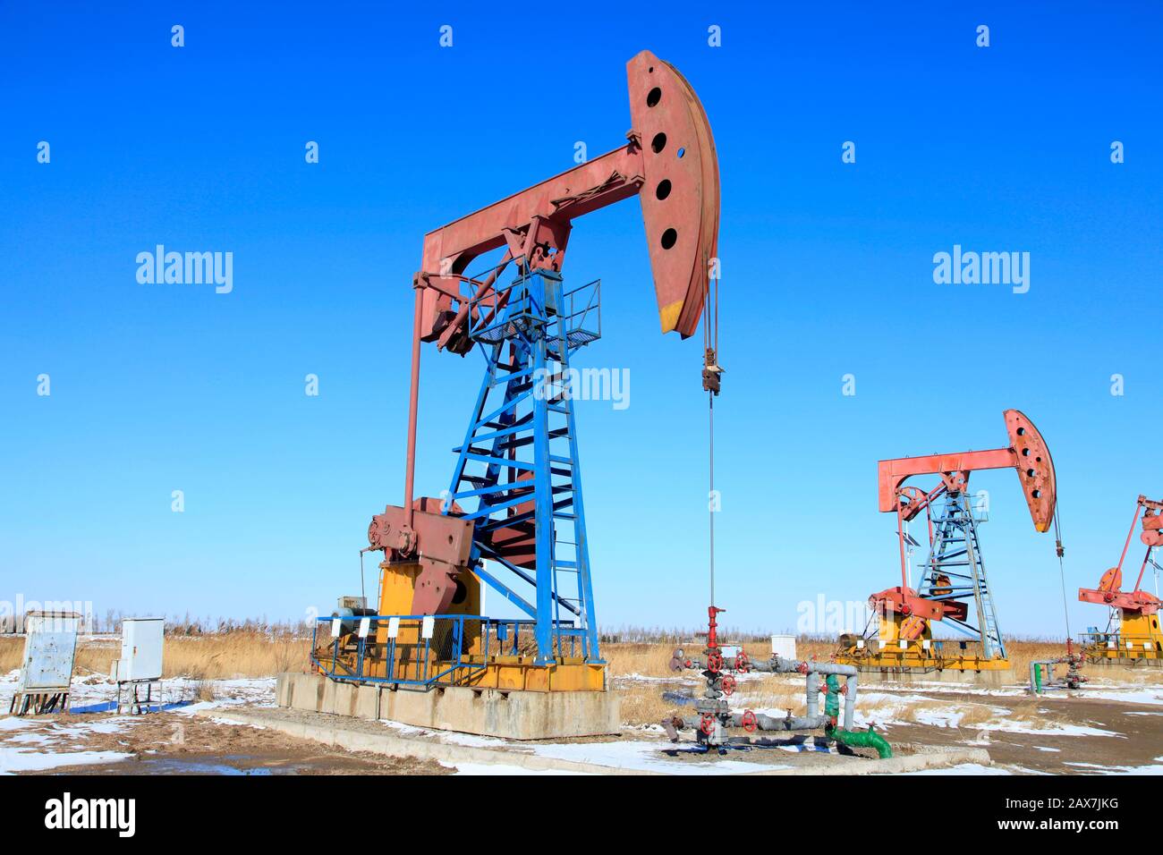 Oil field, oil pump in the work Stock Photo - Alamy