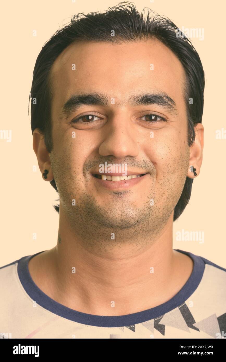 Smiling middle eastern man face hi-res stock photography and images - Alamy