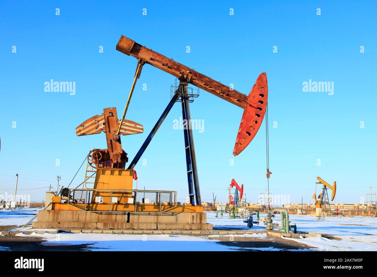 Oil field, oil pump in the work Stock Photo - Alamy