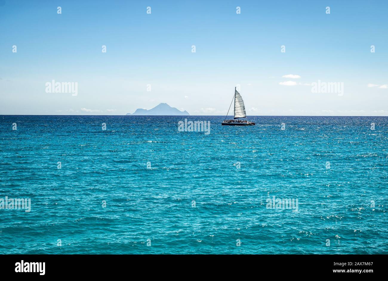 Catamaran boat sailing in the Caribbean Stock Photo - Alamy