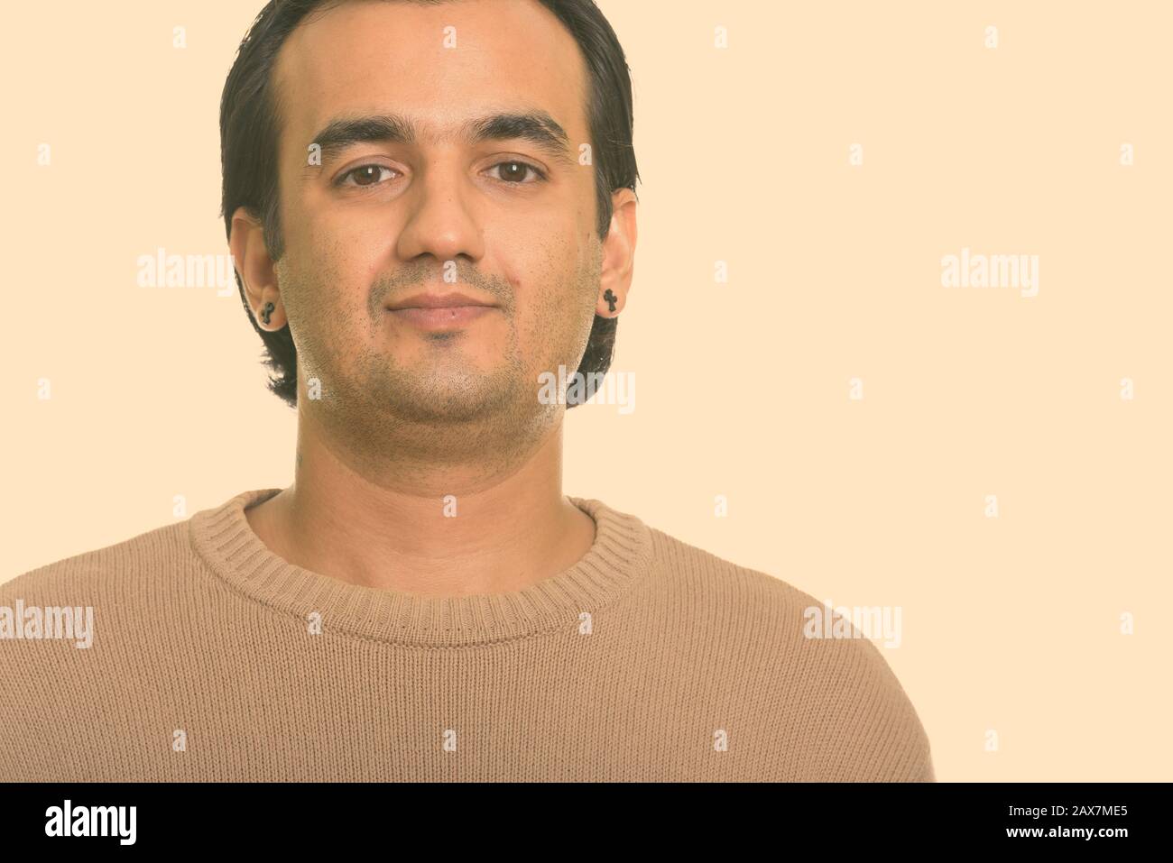 Face of Persian man looking at camera Stock Photo - Alamy
