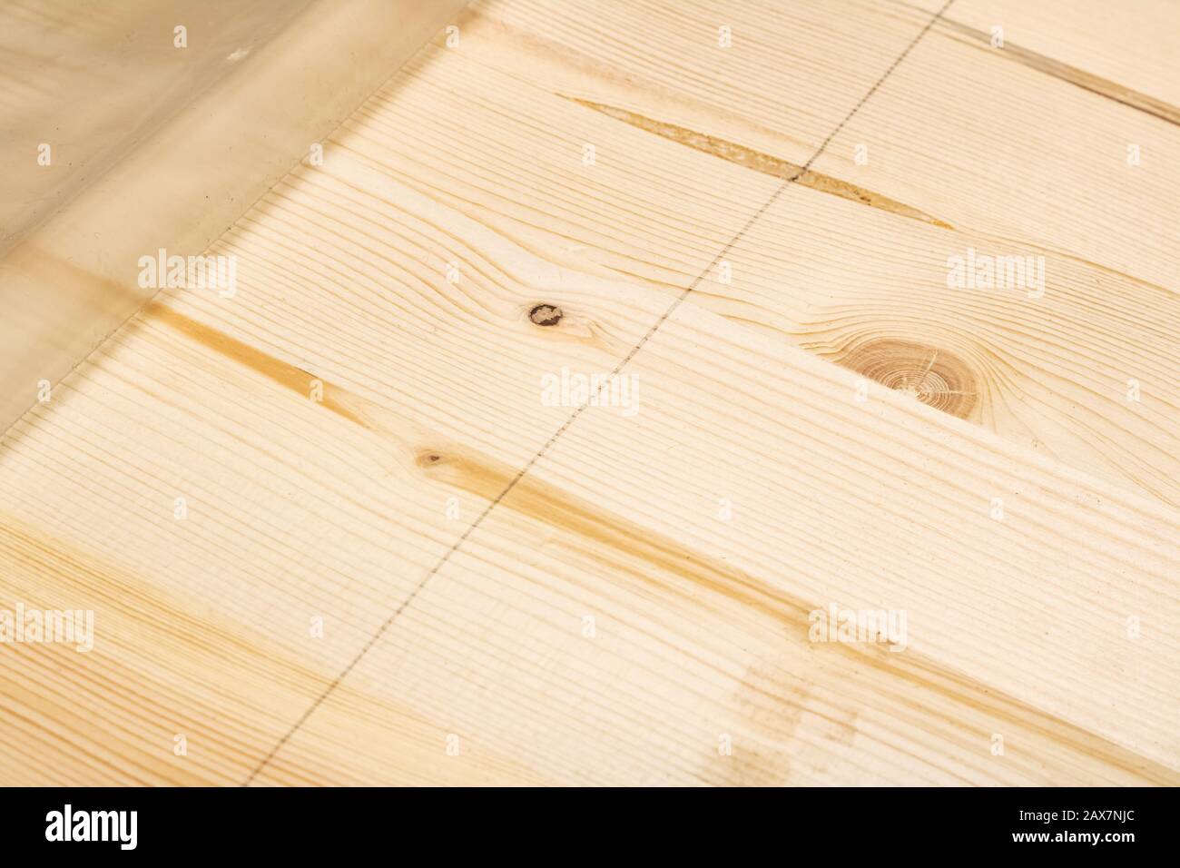 Marking with line pencil on wooden board close up Stock Photo - Alamy