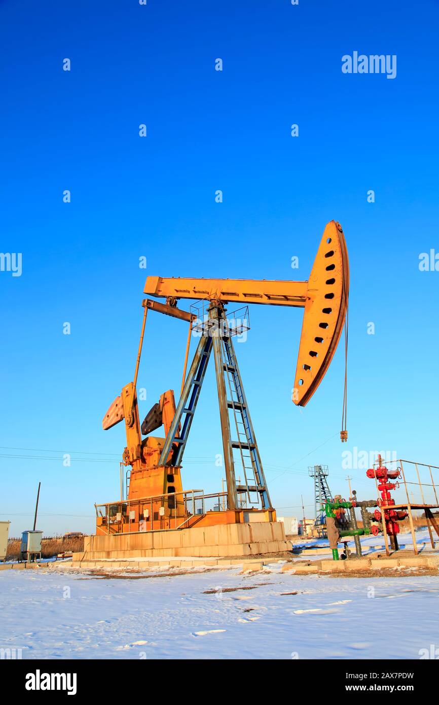Oil field, oil pump in the work Stock Photo - Alamy