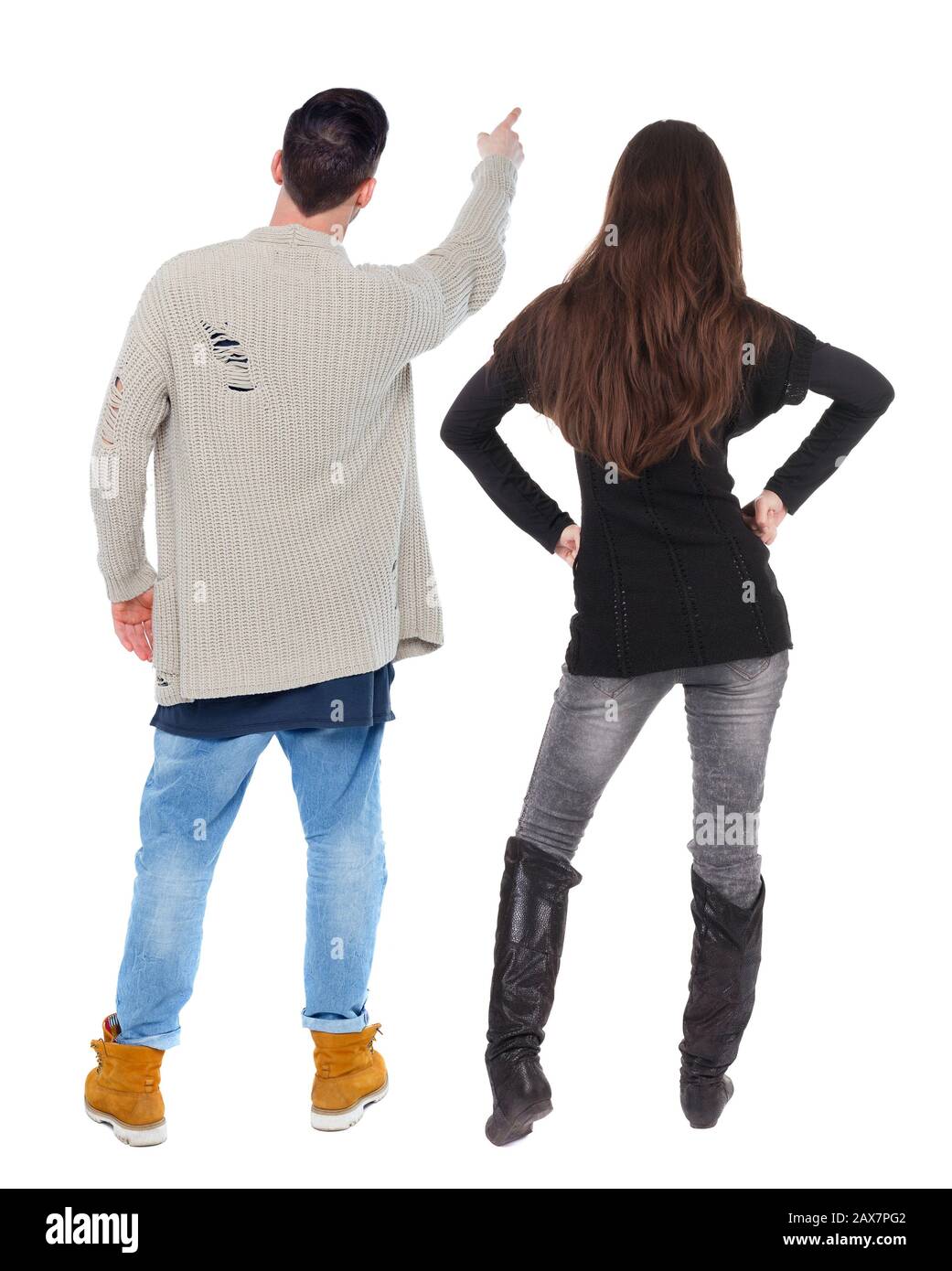 Back view of couple couple in sweater pointing. beautiful friendly girl ...