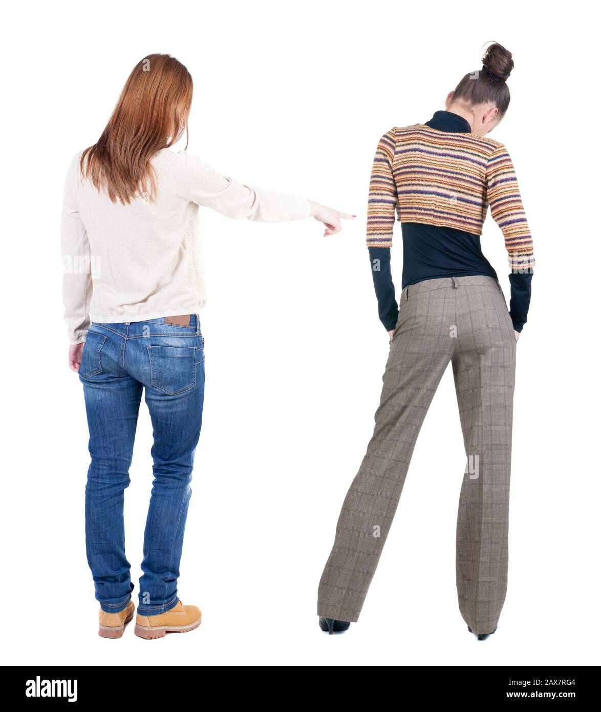 Back view of two pointing young girl in sweater. Rear view people ...