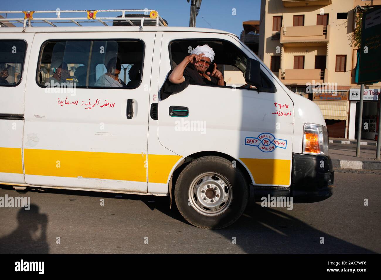 Cairo, Egypt, A man in a microbus reacts to me photographing him and the street Stock Photo - Alamy