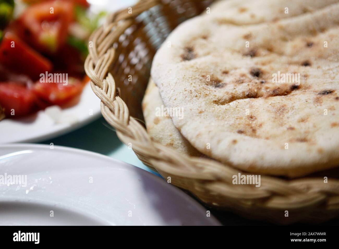 Egyptian Bread, Eesh baladi, served at a resteraunt in Aswan Stock ...